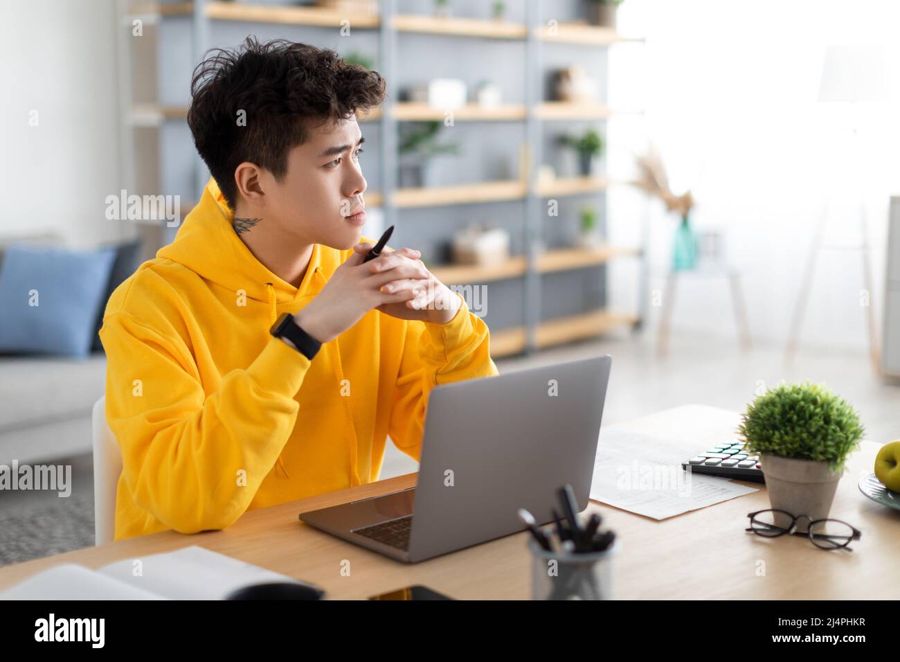 Pensive focused businessman sitting hi-res stock photography and images ...