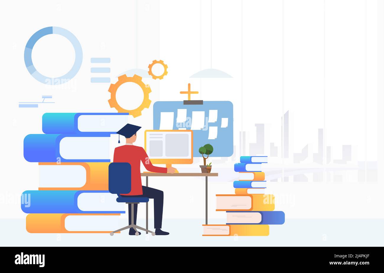 Student in graduation cap using computer at desk. University ...