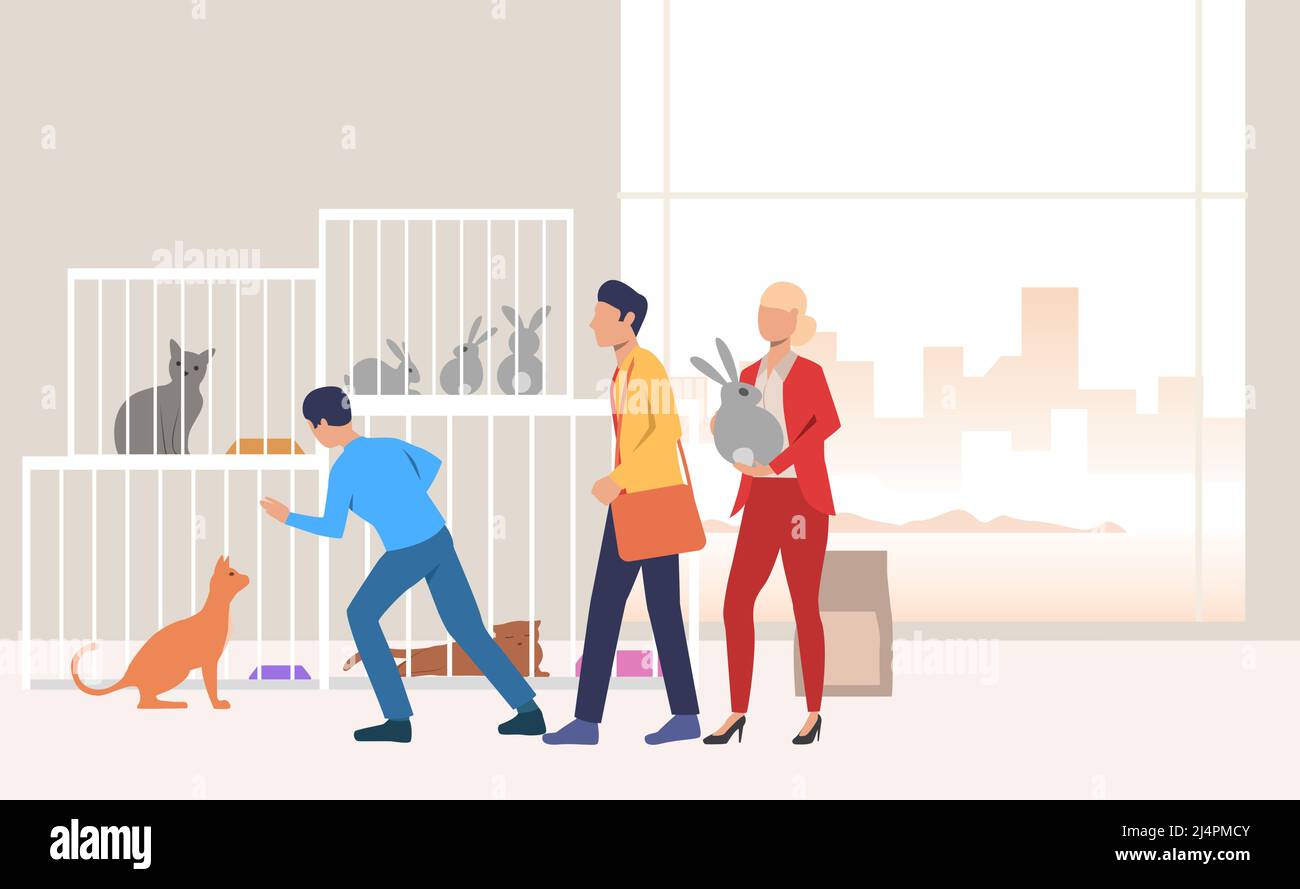 People adopting pet from animal shelter, volunteer holding rabbit ...