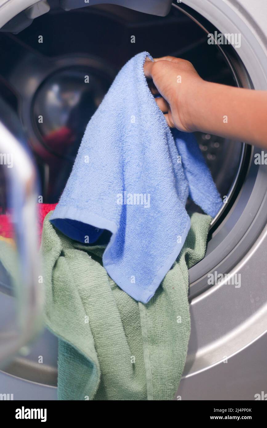Putting towel hi-res stock photography and images - Alamy