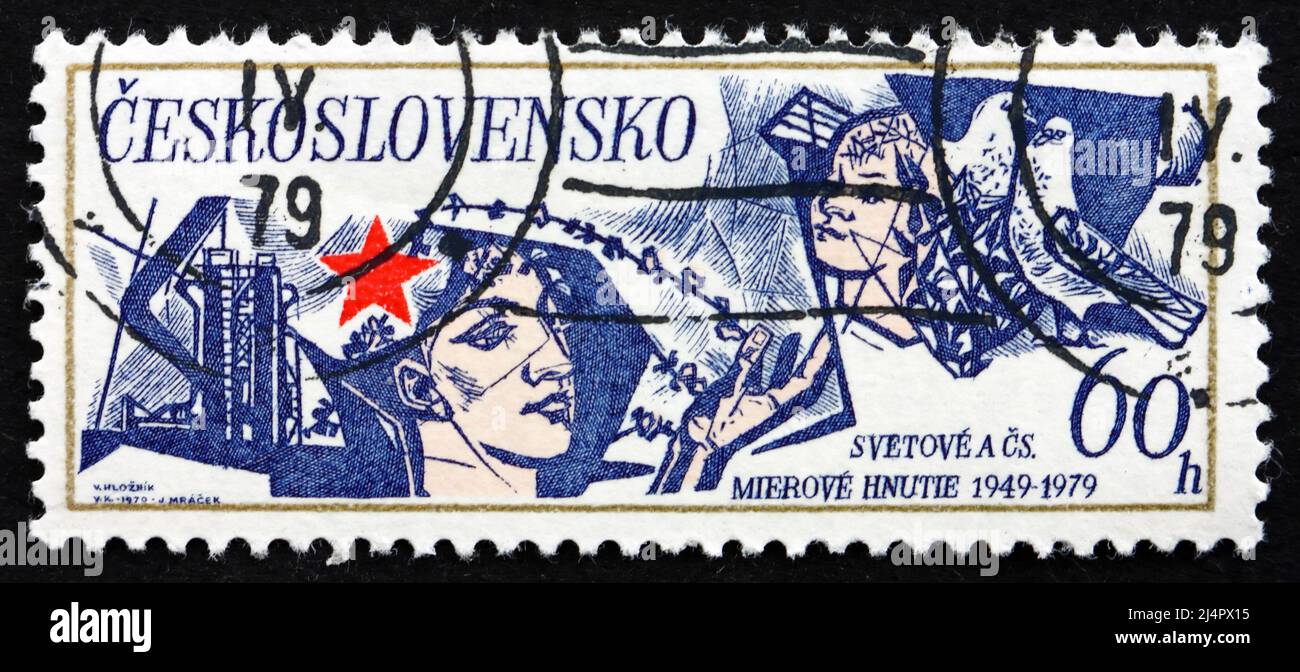 CZECHOSLOVAKIA - CIRCA 1979: a stamp printed in the Czechoslovakia shows Red Star, Man, Child ...