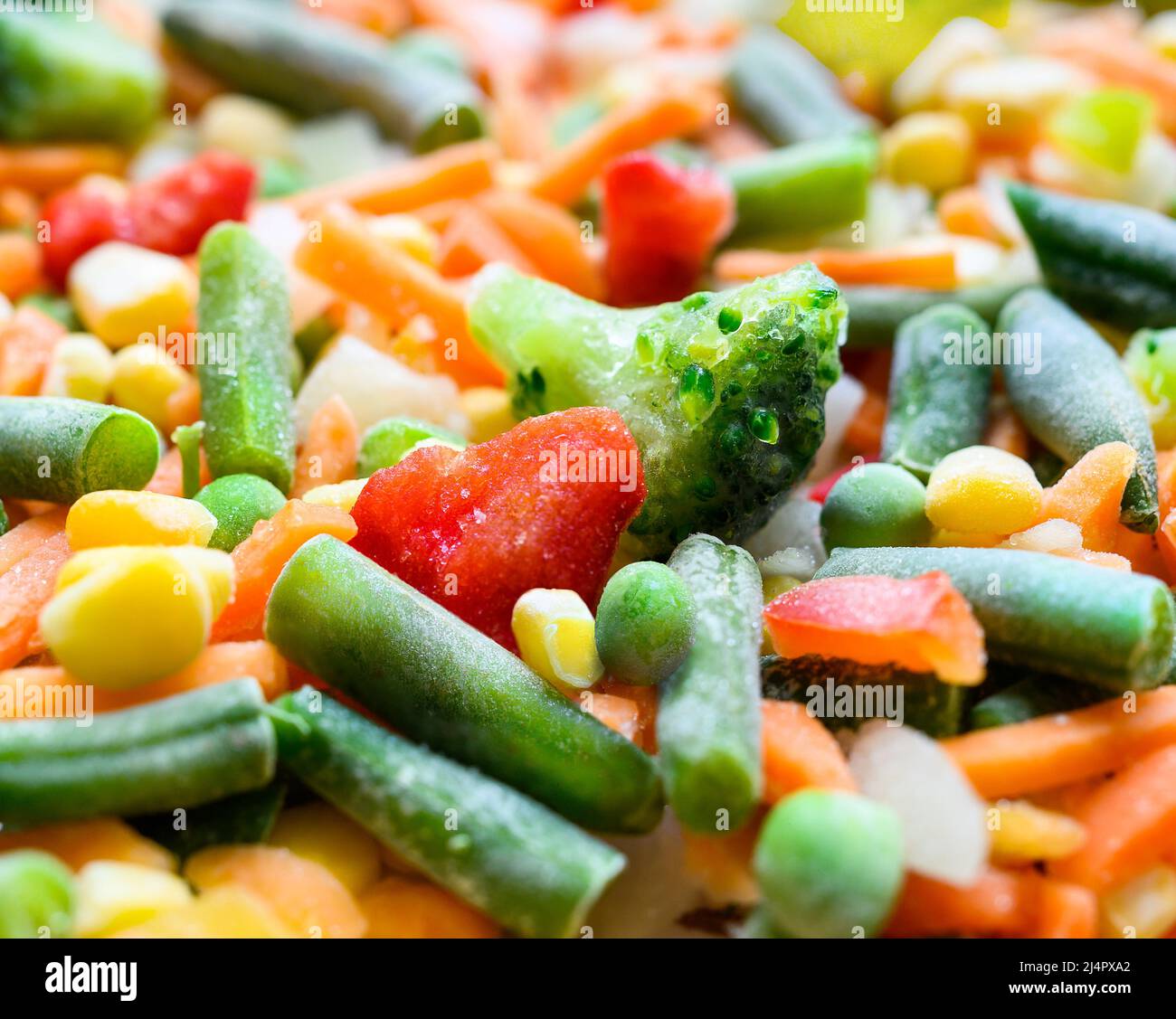Frozen vegetable mixture of carrots, corn, peas, legume, broccoli ...