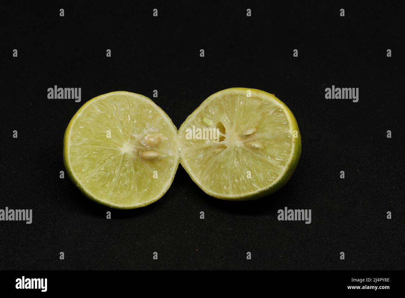 Two lemon pieces hi-res stock photography and images - Alamy