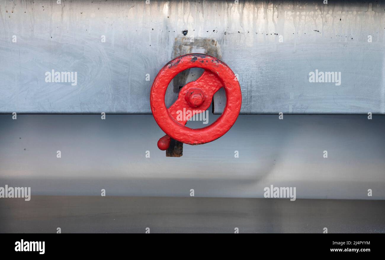 lonely old red round crank Stock Photo - Alamy
