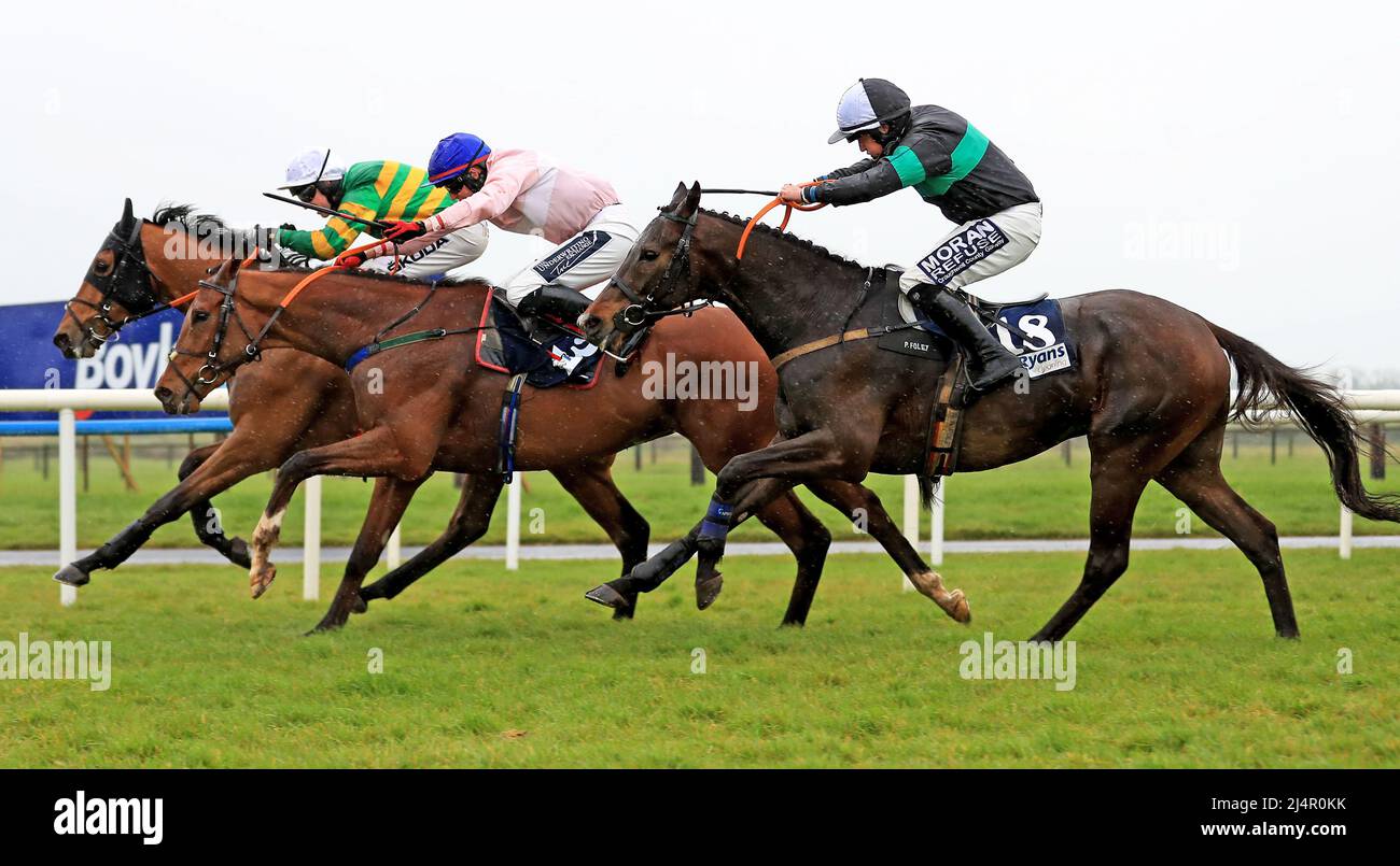 Imperial Ruler ridden by jockey Keith Donoughue (centre) clear the last ...