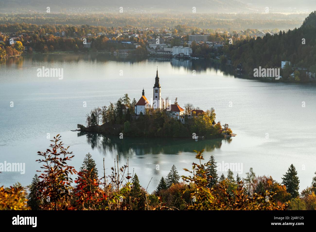 Magical autumn landscape with an island on Lake Bled. Julian Alps ...