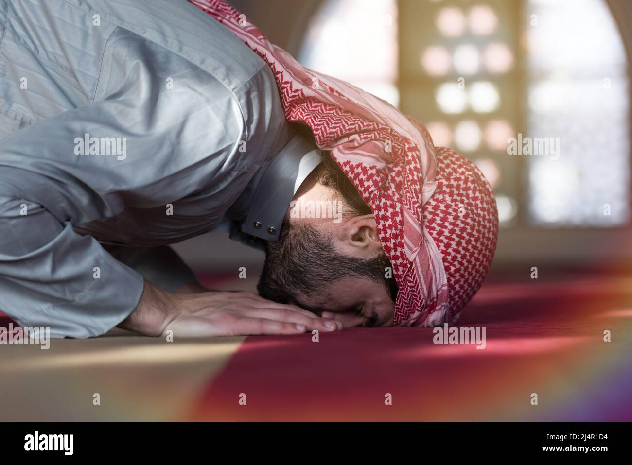 Muslim Arabic man praying. Religious muslim man praying inside the ...