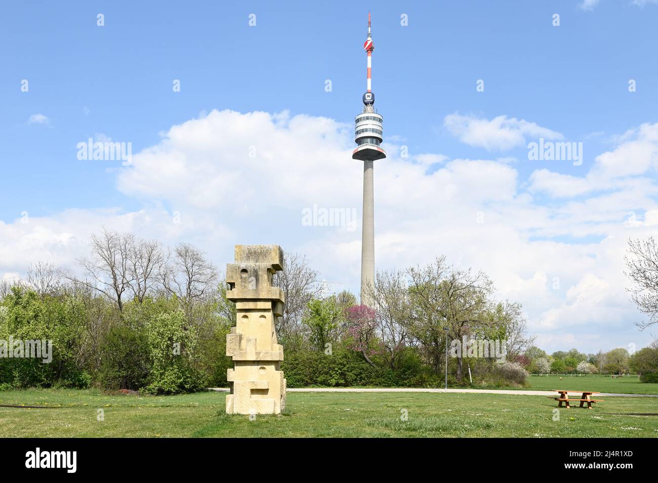 Vienna, Austria. Stone sculpture and the Danube Tower in the Danube ...