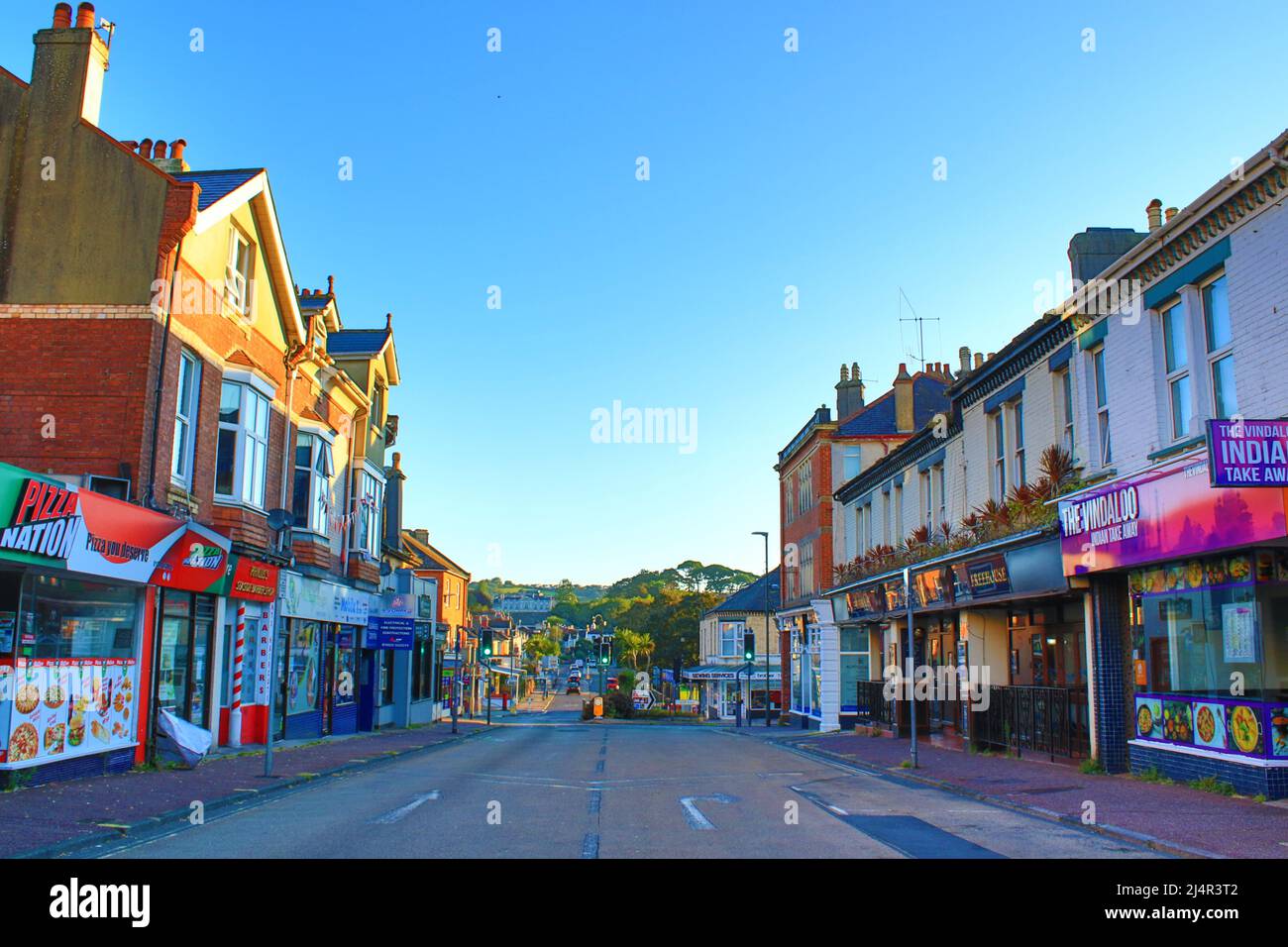 View of the main street of Paignton on nice summer morning.Paignton is ...