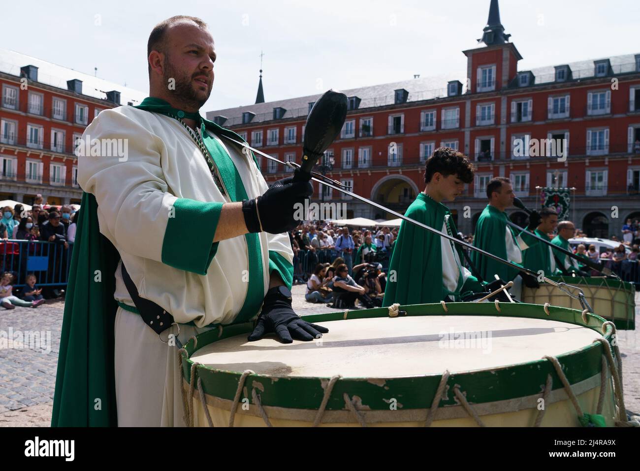 Madrid, Spain. 17th Apr, 2022. A male drummer with green robes plays a ...