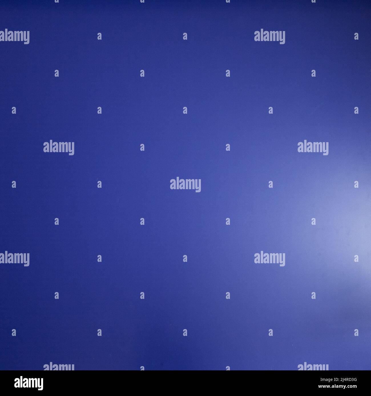 Background and texture - flat blue background with light flare Stock ...