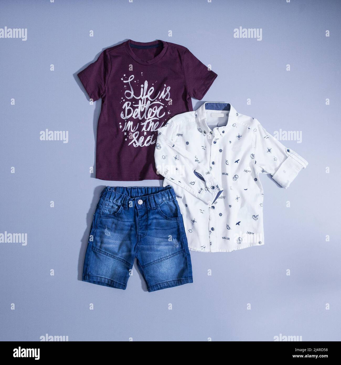 Kids fashion - Toddler boy clothing set: shorts and t-shirt Stock Photo ...
