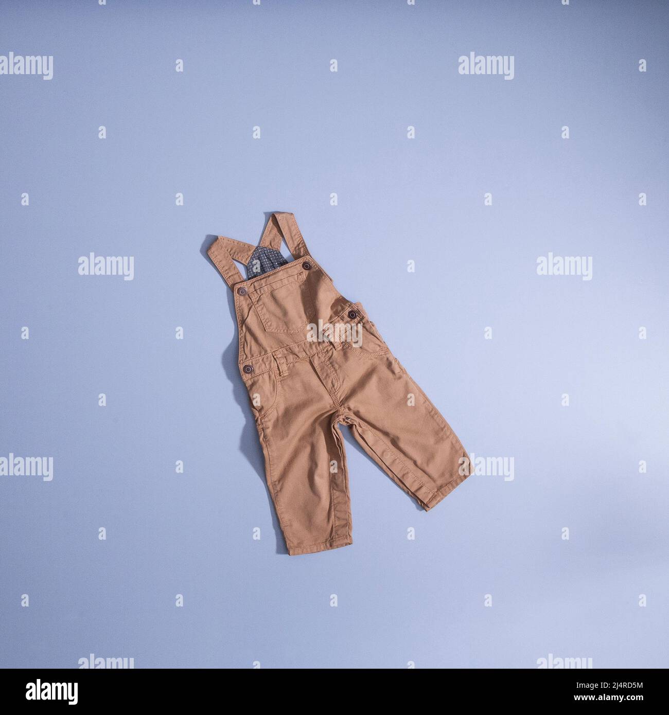 Kids fashion - Overalls for a little boy Stock Photo - Alamy