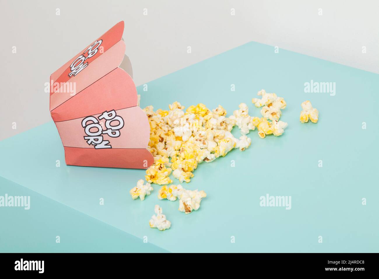 Front view of popcorn inside the package; some scattered in the ...
