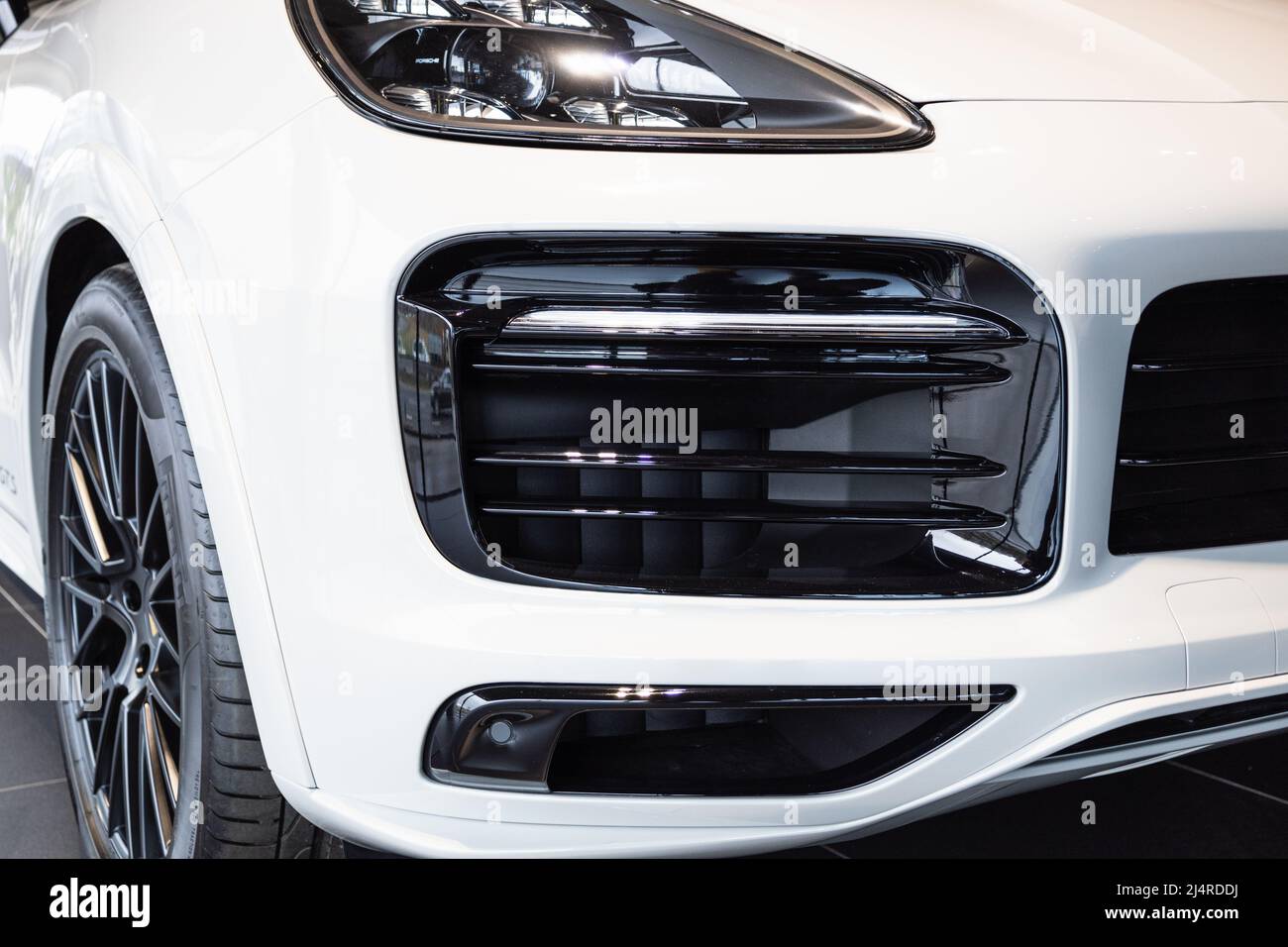 White Porsche Cayenne GTS front view Stock Photo - Alamy