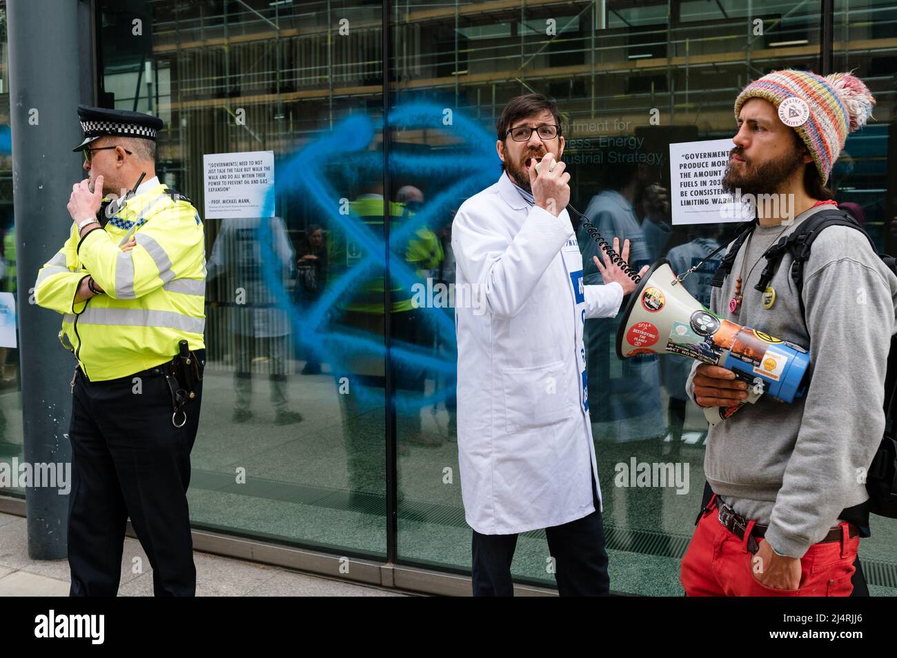 London, UK. 13 April 2022. Extinction Rebellion and XR Scientists glued ...
