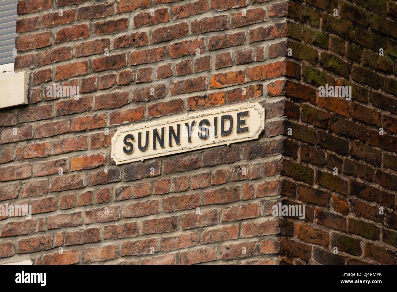 Street sign wall brickwork name hi-res stock photography and images - Alamy