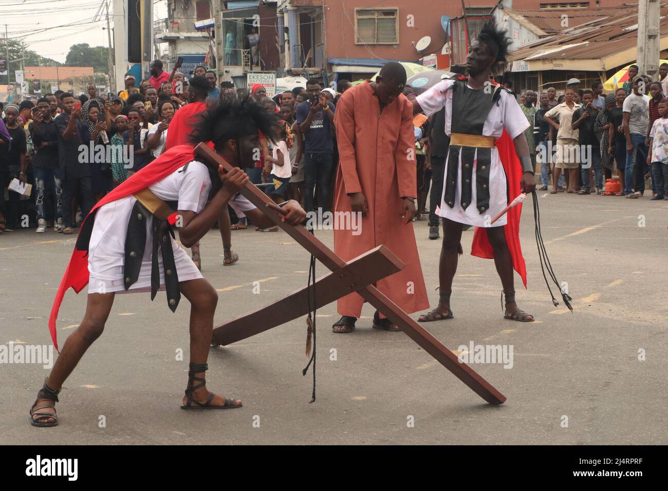 Catholic faithful In Ikeja area of Lagos, portraying Jesus Christ ...