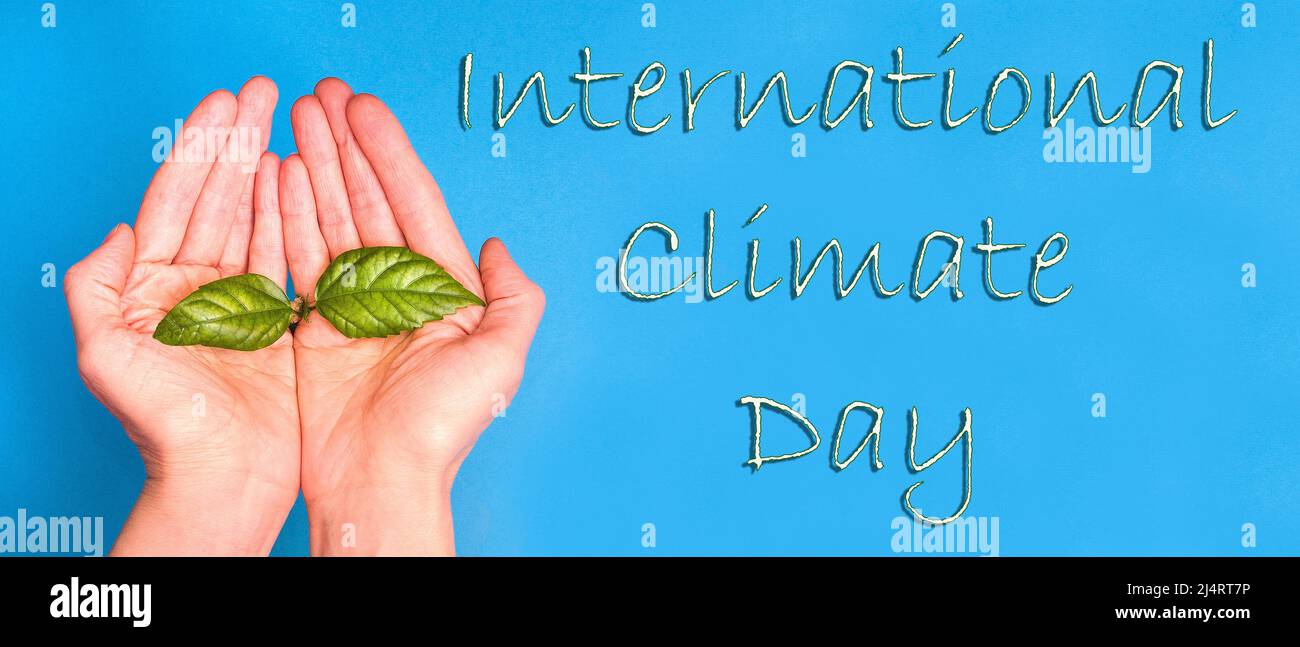The inscription international climate day on a blue background with ...