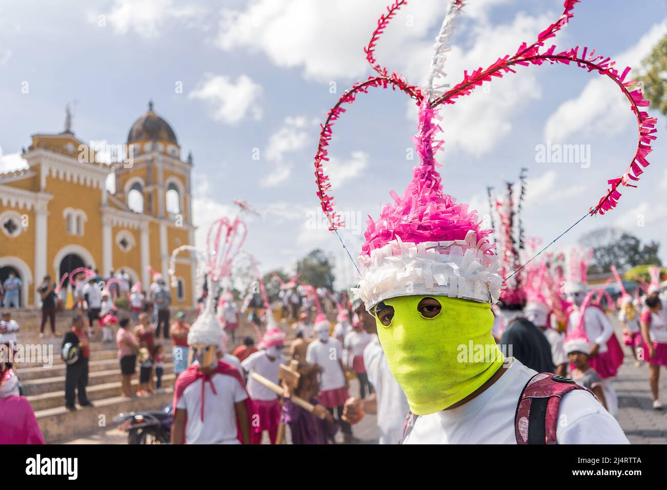 Close-up of an unrecognizable masked Latino man participating in a ...