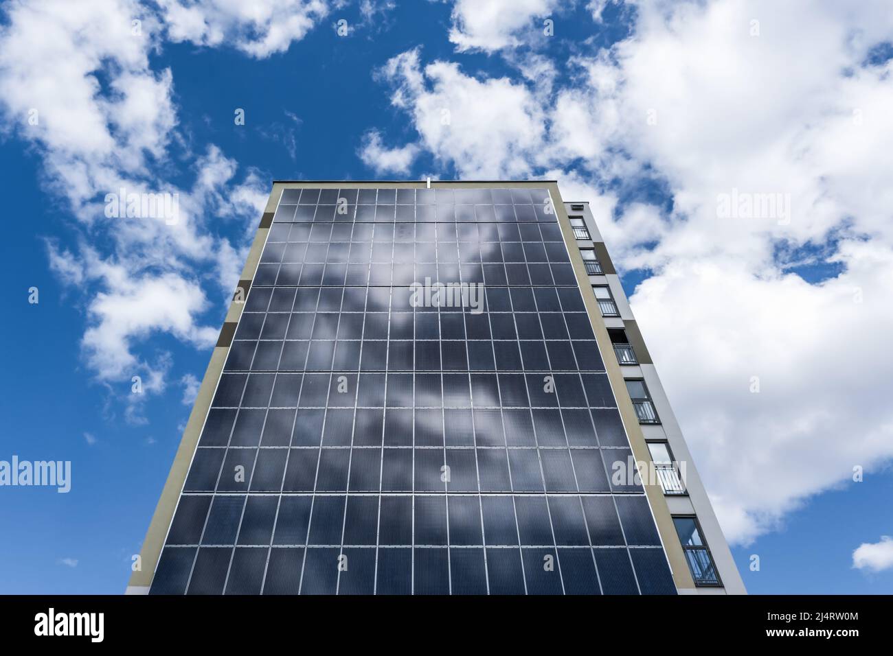 solar panels on the wall of a multi-storey building. Renewable solar ...