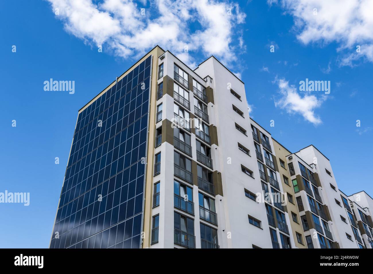 solar panels on the wall of a multi-storey building. Renewable solar ...