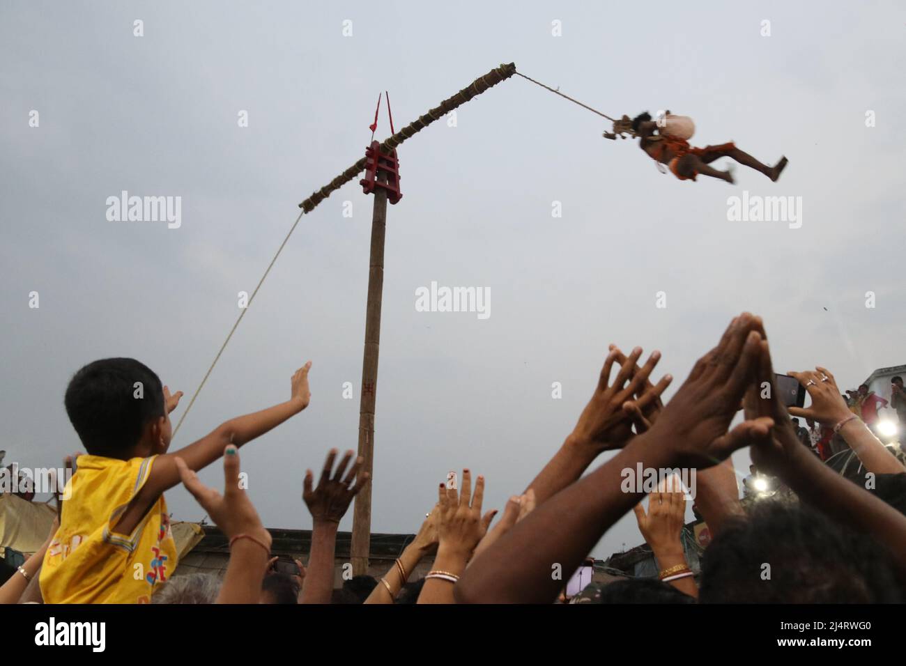 (4/14/2022) Devotees gather to witness Charak on the eve of Bengali New ...
