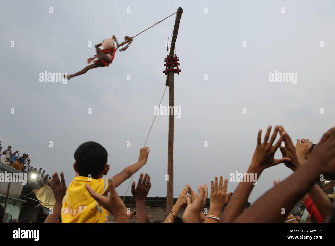(4/14/2022) Devotees gather to witness Charak on the eve of Bengali New ...