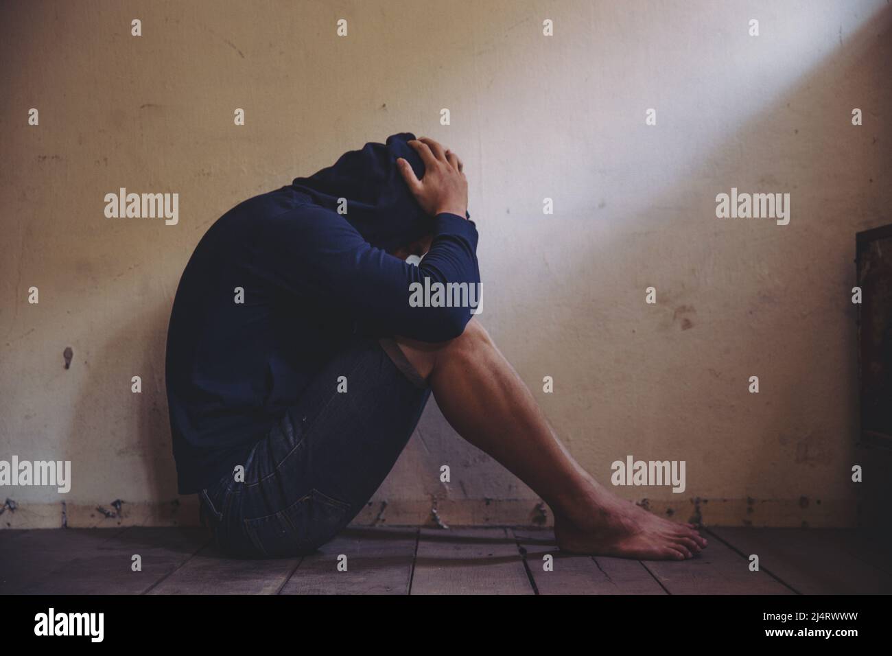 Man Sitting Alone In The Dark