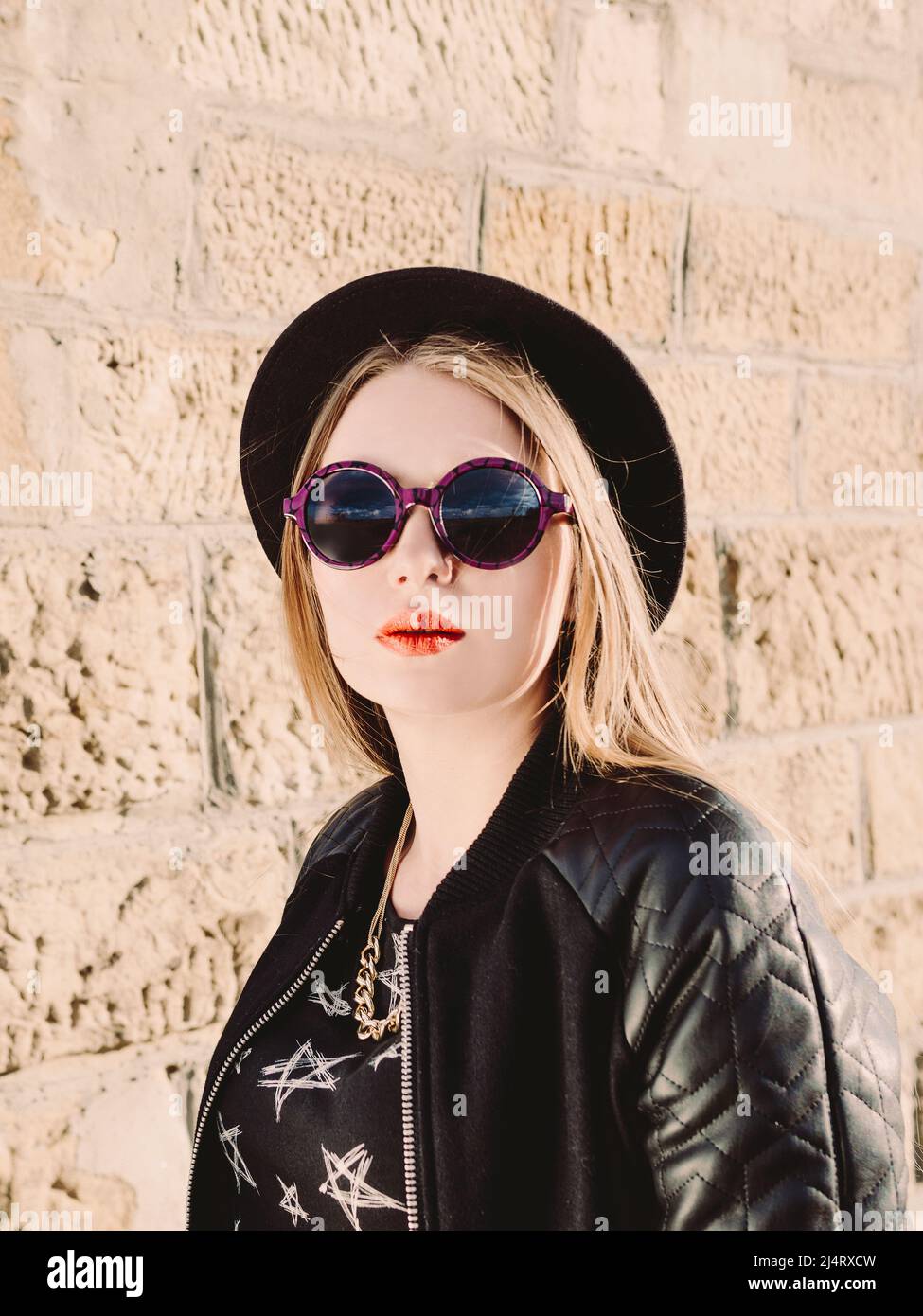 Stylish hipster woman traveler by the old bridge viaduct. Traveling ...