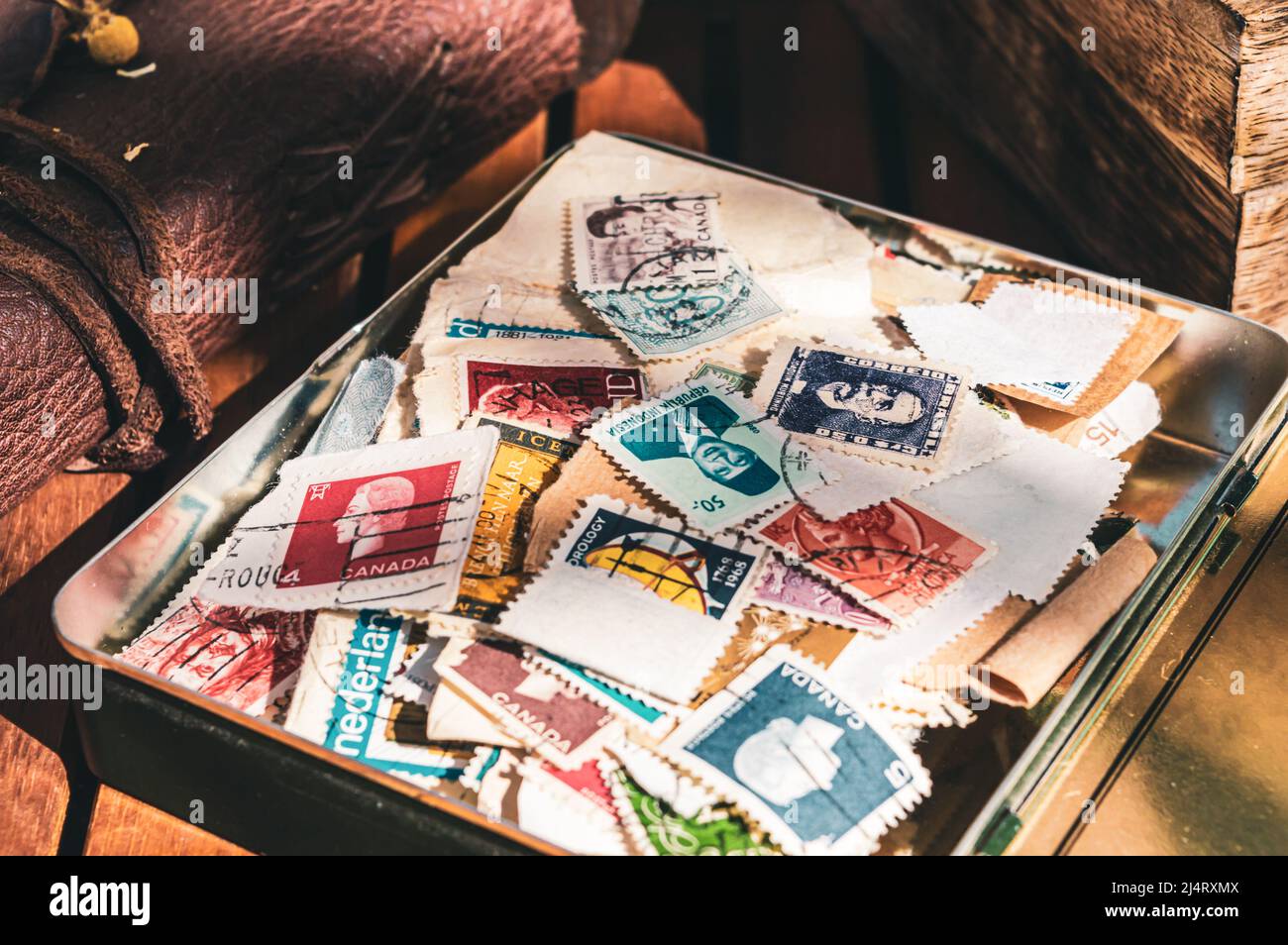 Image of a collection of old postage stamps in an old cigar box Stock ...