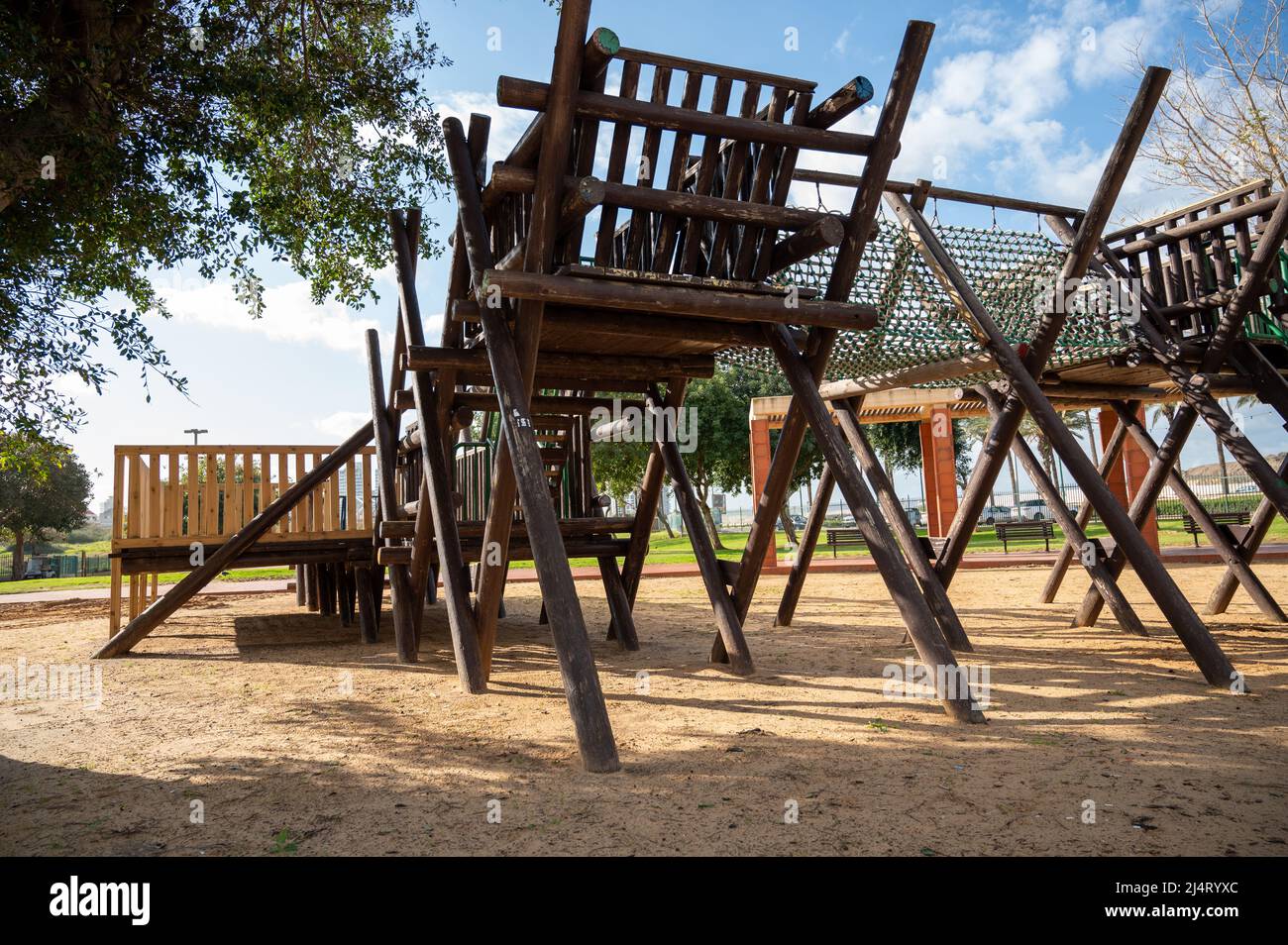 The outdoor playground is equipped with slides and equipment for ...
