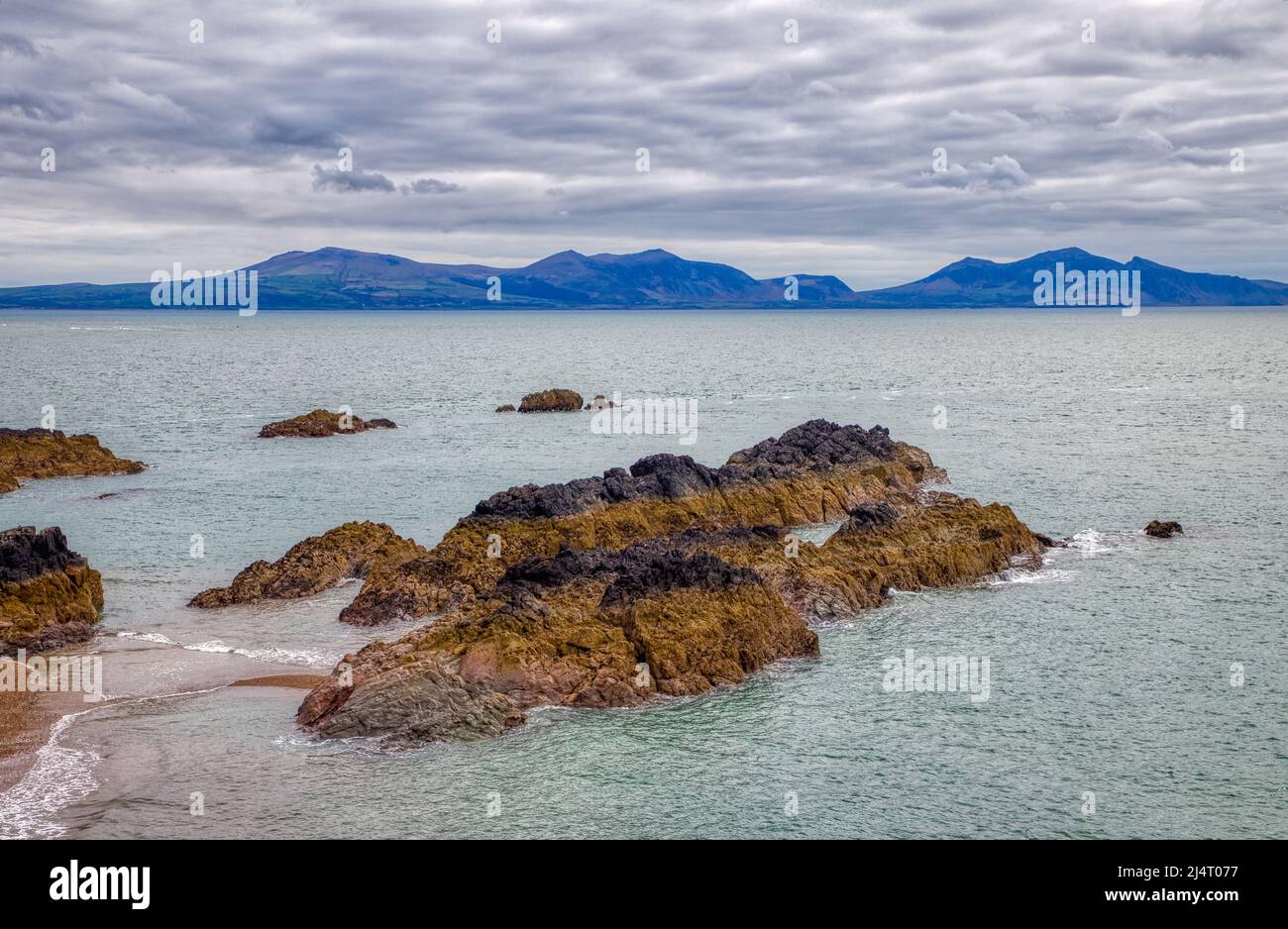 Rocks in Sea, Llanddwyn Island, Newborough, Anglesey, North Wales Stock ...