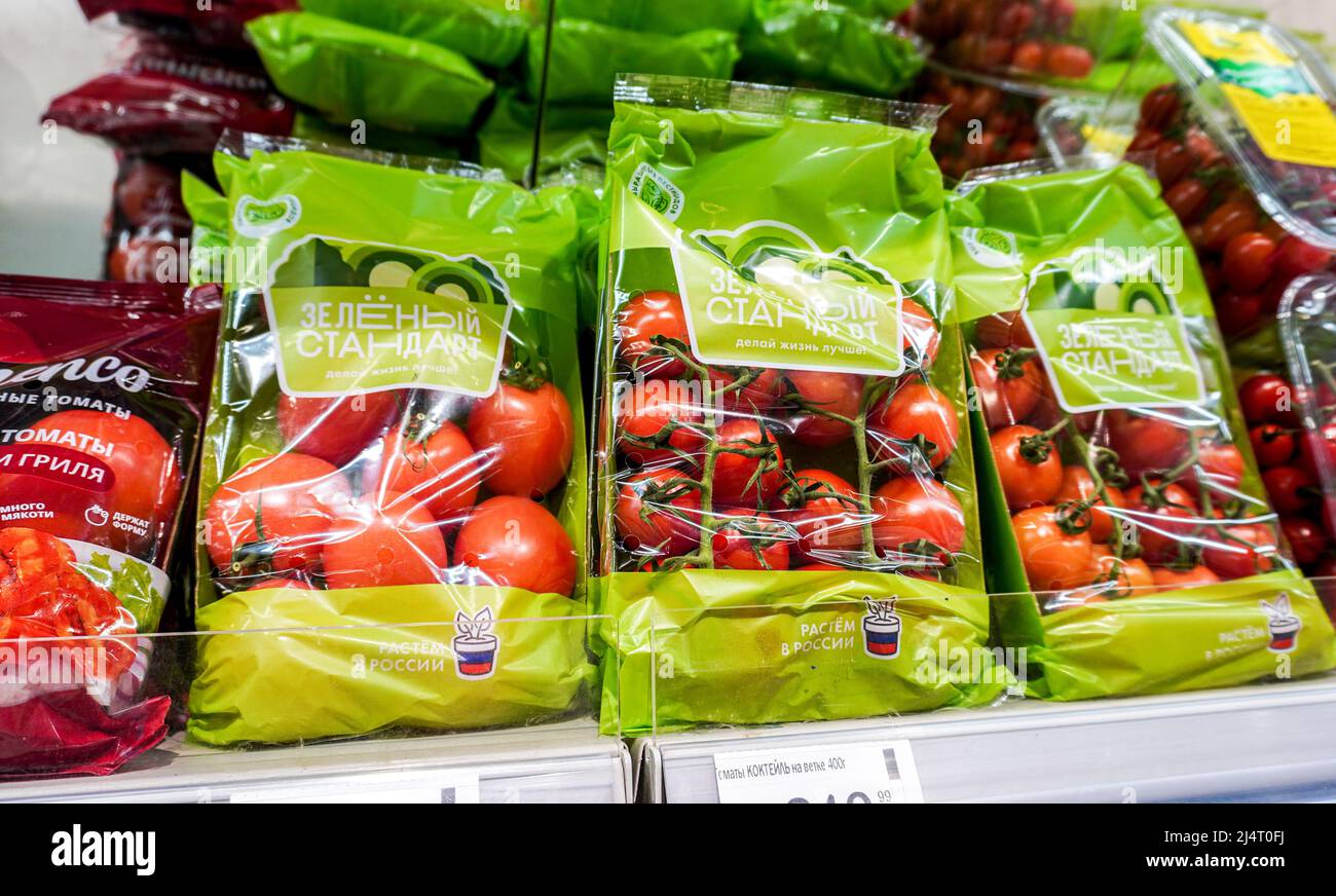 Samara, Russia - April 16, 2022: Fresh natural tomatoes in plastic bags ...