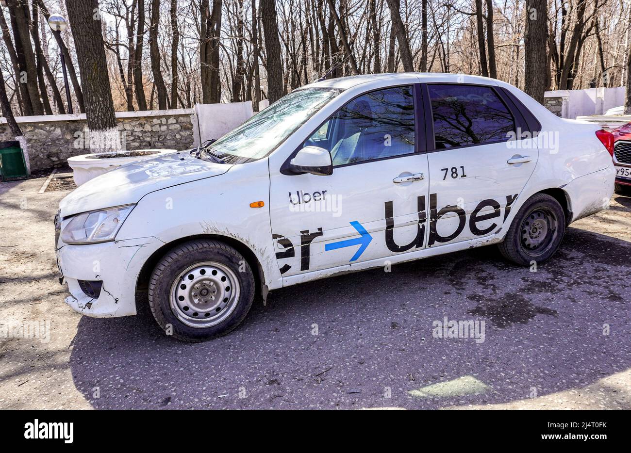 Samara, Russia - April 16, 2022: Uber taxi cab is parked on a city ...