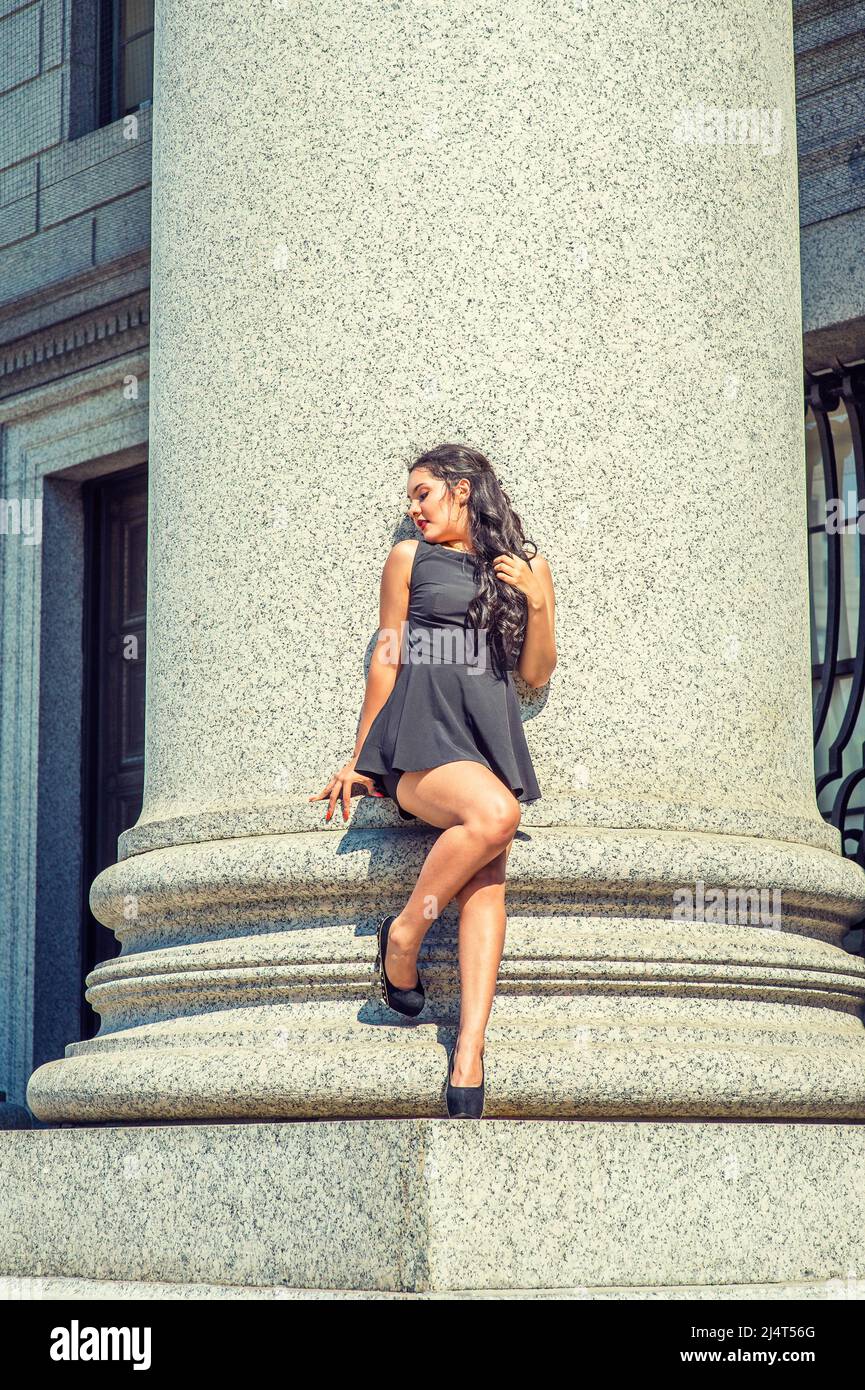 College Student. Dressing in black, sleeveless top, short pants, high ...