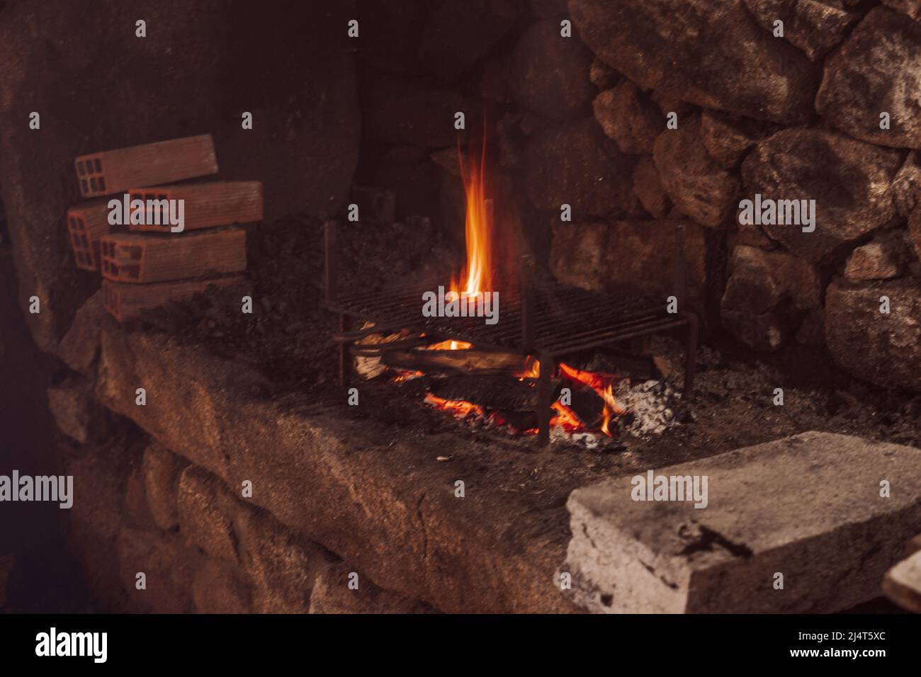 small fire made for a rural indoors barbecue on the countryside Stock ...