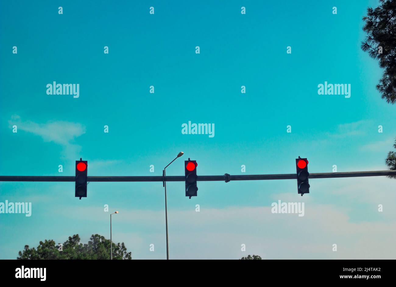 Traffic lights. Sky and red lit traffic light Stock Photo - Alamy