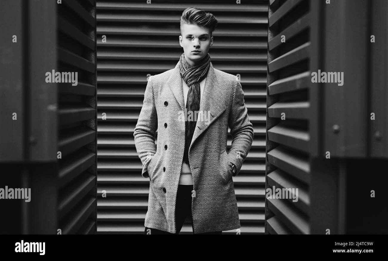 Young man in business coat Black and White Stock Photos & Images - Alamy