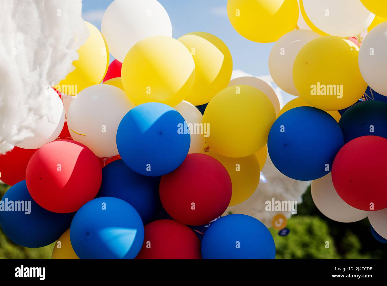 Many colored balloons celebrating. Party decor Stock Photo - Alamy