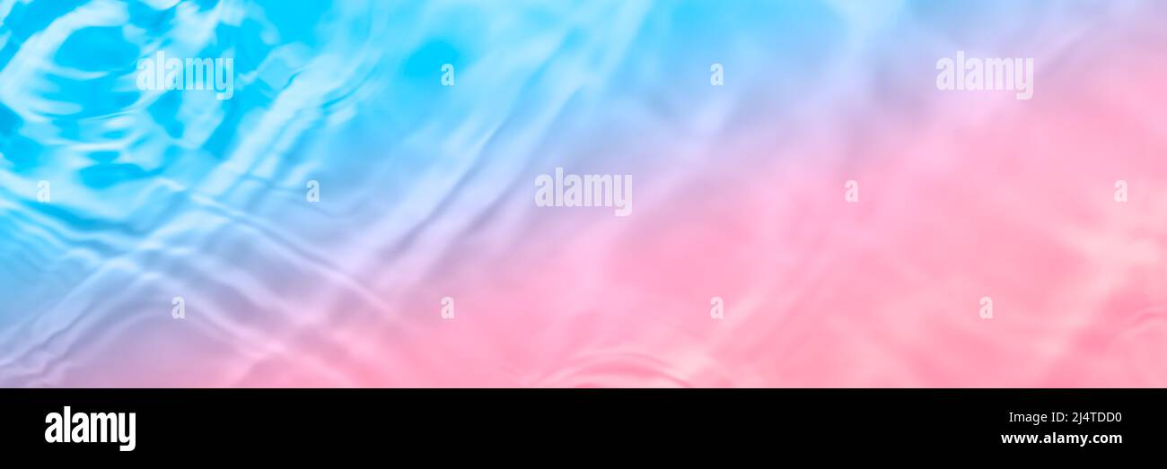 Serum or water texture close up. Light blue and pink gradient liquid ...