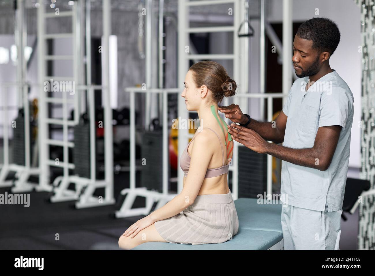 Woman physio therapy back view hi-res stock photography and images - Alamy