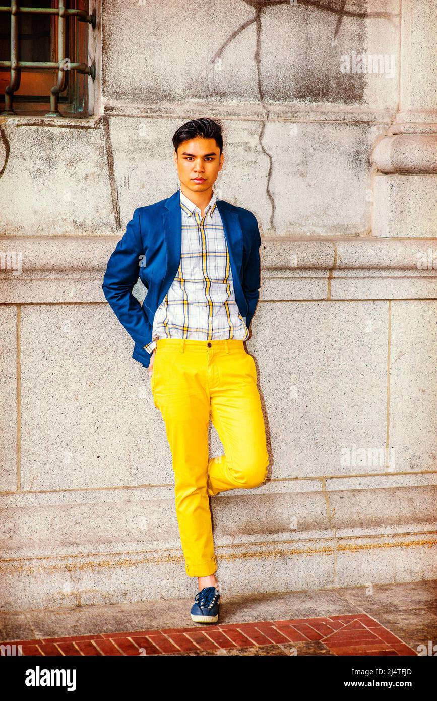 Man Relaxing Outside. Dressing in blue blazer, unbuttoned, patterned ...