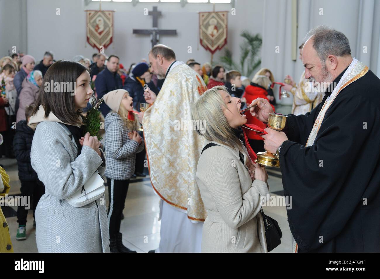 Lviv, Ukraine. 17th Apr, 2022. Ukrainian believers receive holy ...
