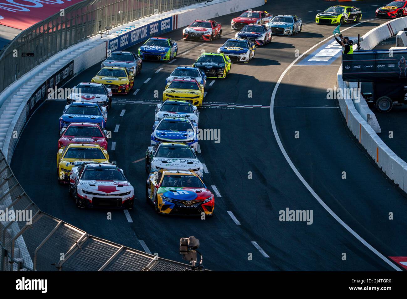 Los Angeles, CA, USA. 6th Feb, 2022. Drivers hit the GEICO restart zone ...