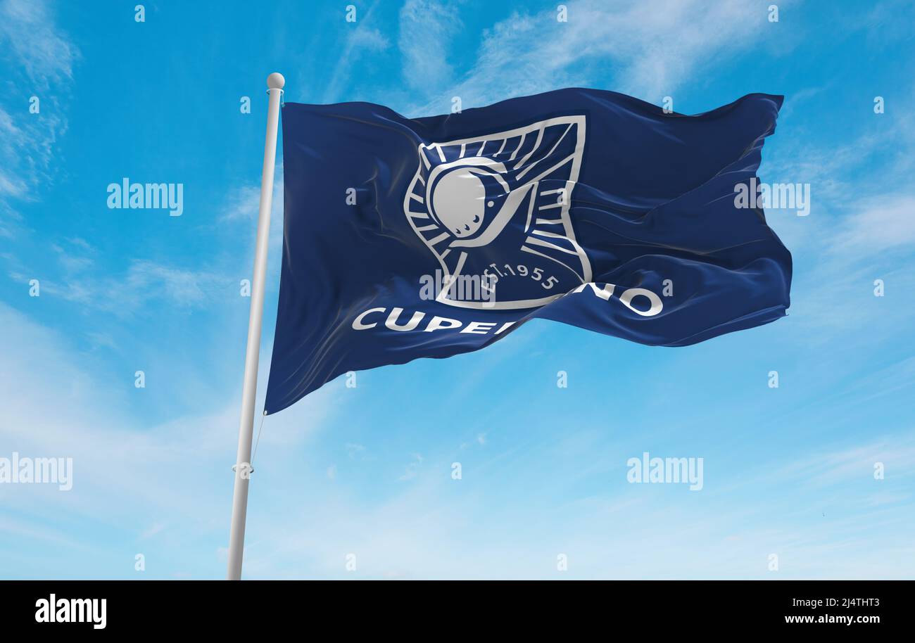 flag of Cupertino, California at cloudy sky background on sunset ...