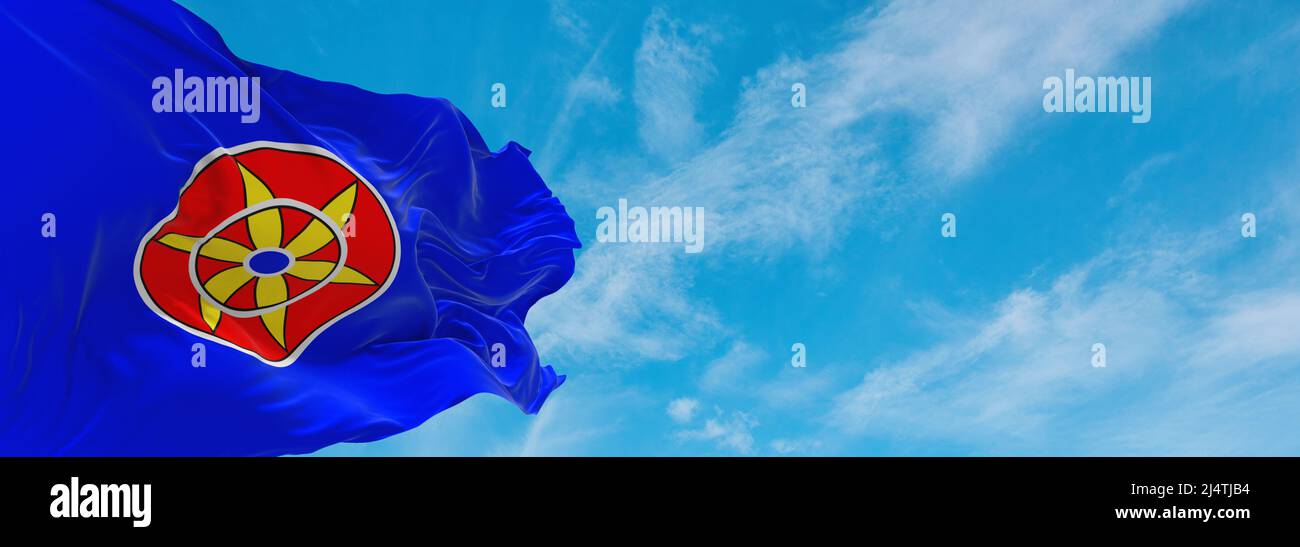 official flag of Kven people , Norway at cloudy sky background on ...