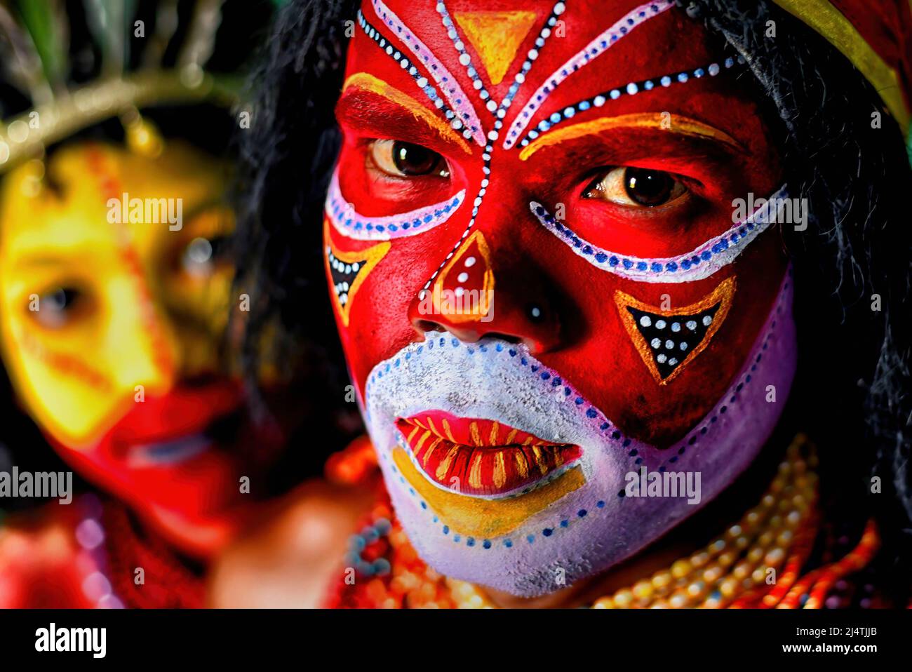 Kolkata, India. 17th Apr, 2022. An artist with his face painted poses ...