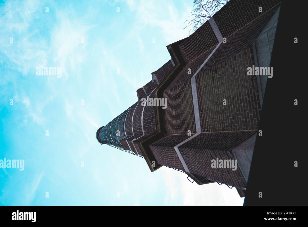 High rise chimney in a Dutch historical industrial district Stock Photo ...