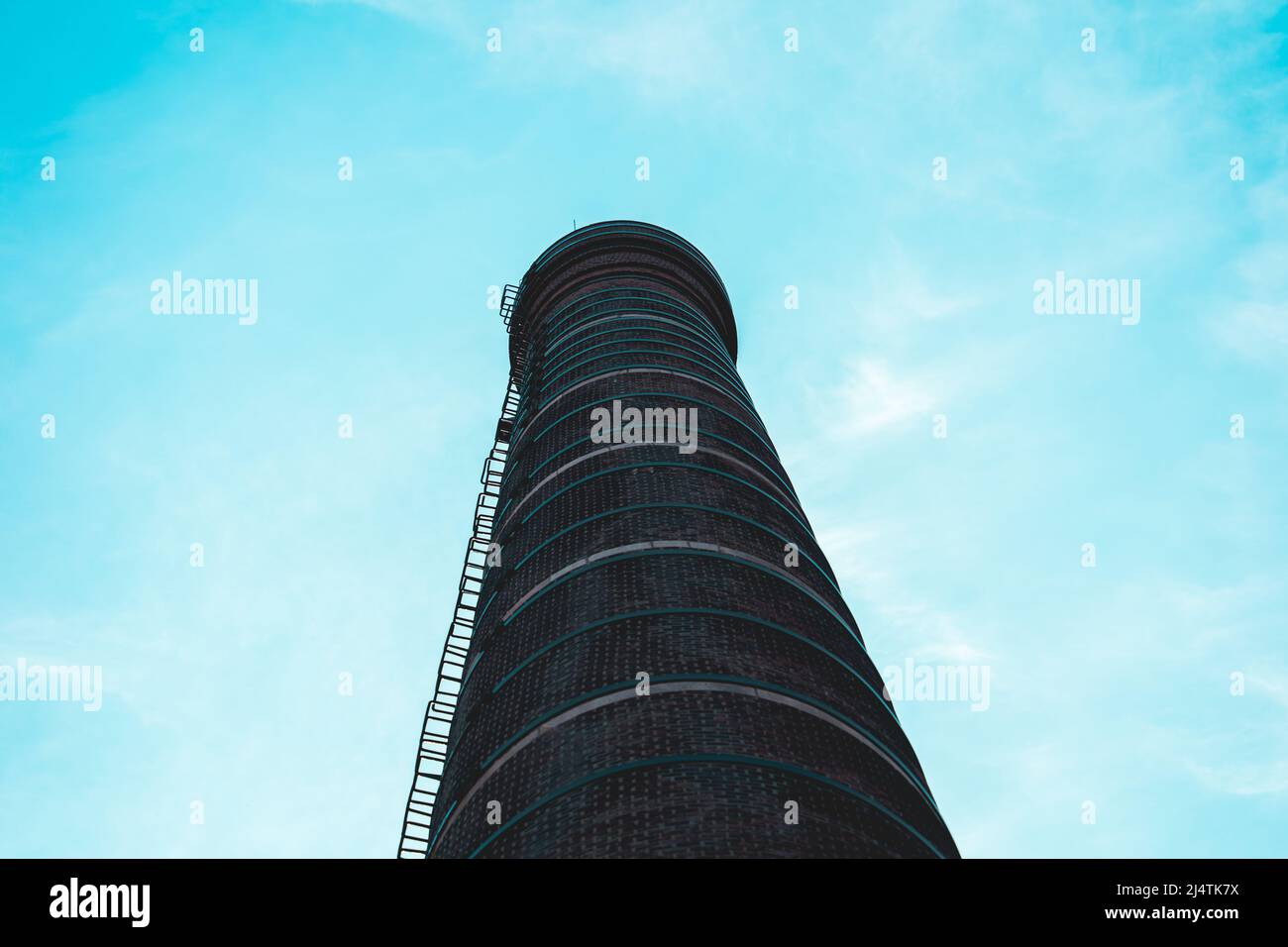 High rise chimney in a Dutch historical industrial district Stock Photo ...